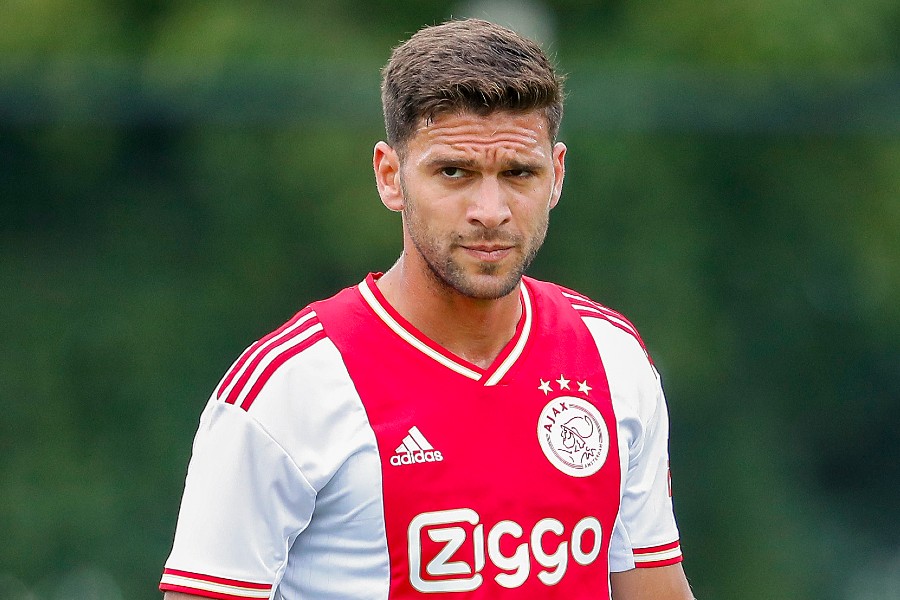 Ajax and Lisandro Magallán terminate contract